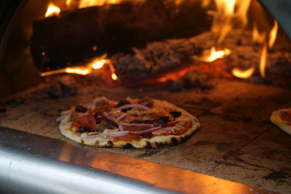 The History of Pizza: Who Made The First Cheesy Slice?