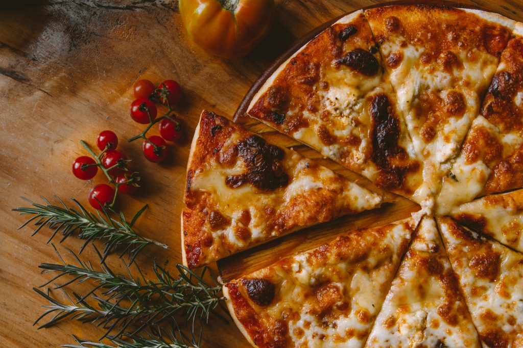The History of Pizza: Who Made The First Cheesy Slice?